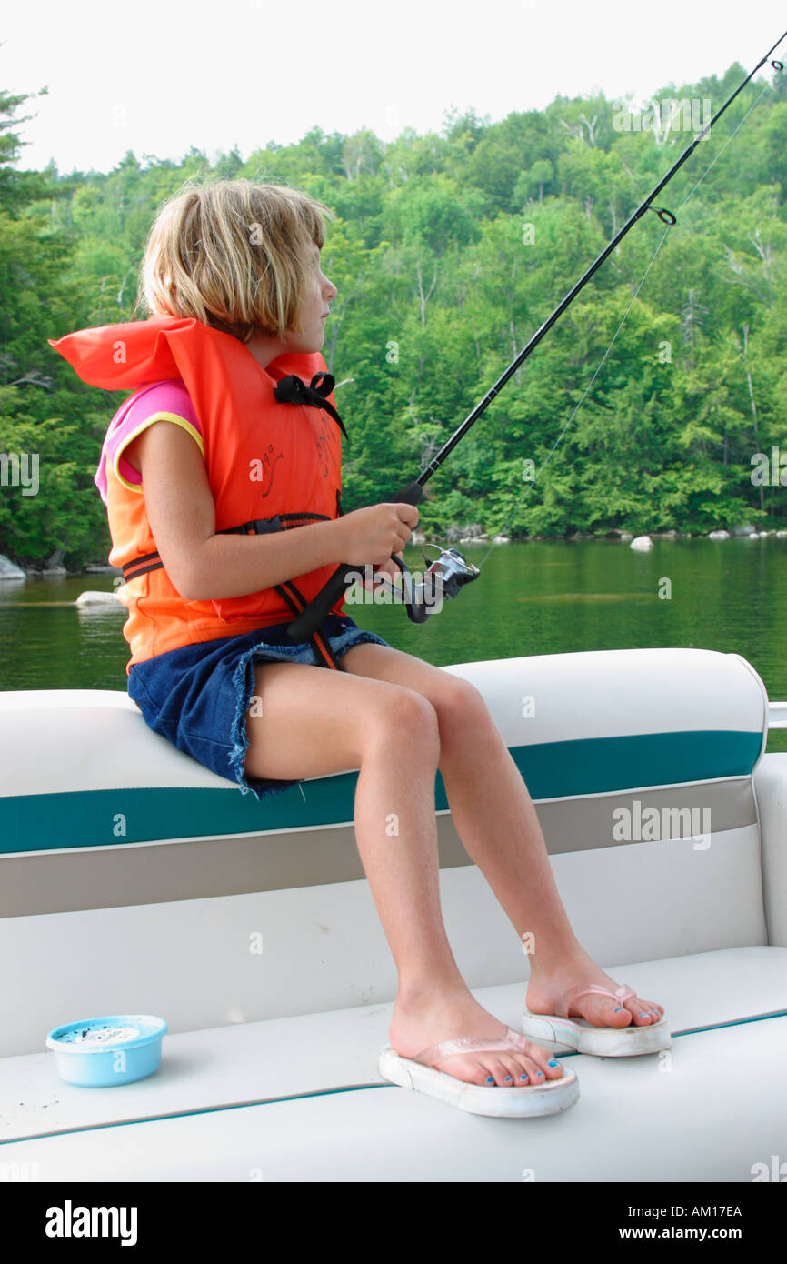 Girl Holding Fishing Rod Stock Photo - Alamy