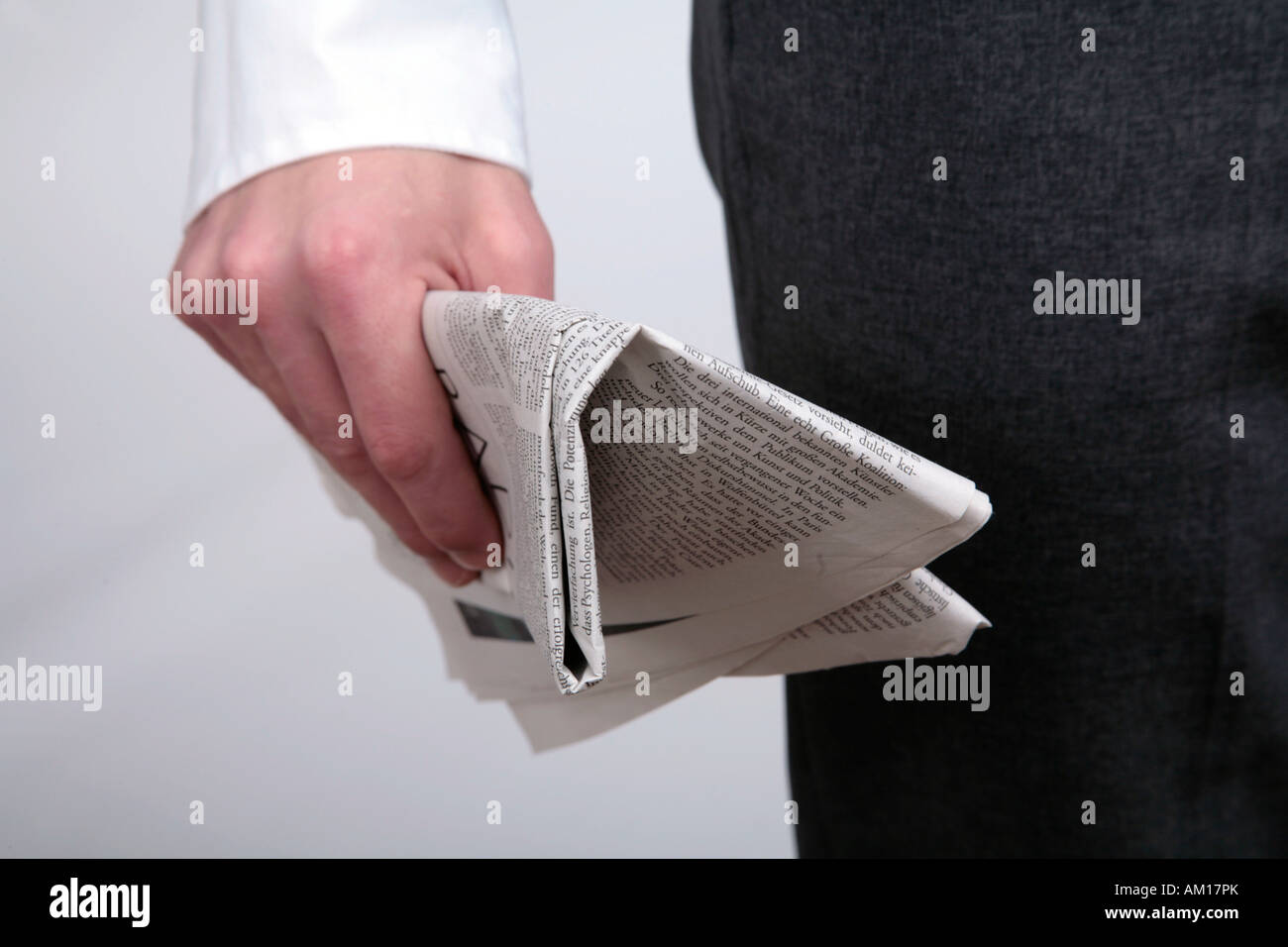 Man with newspaper in the hand Stock Photo - Alamy