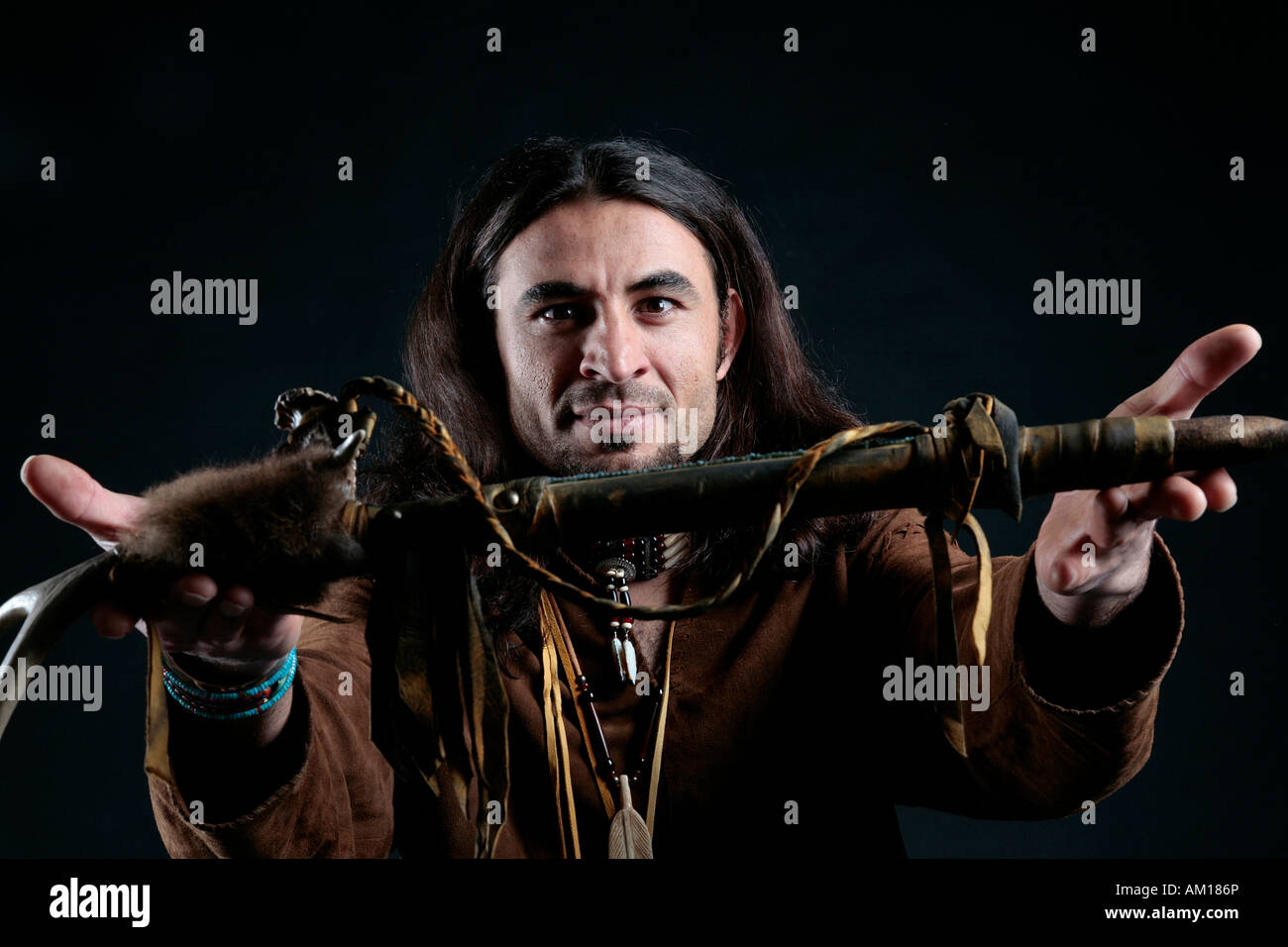 Man wearing indian clothing, calumet Stock Photo - Alamy