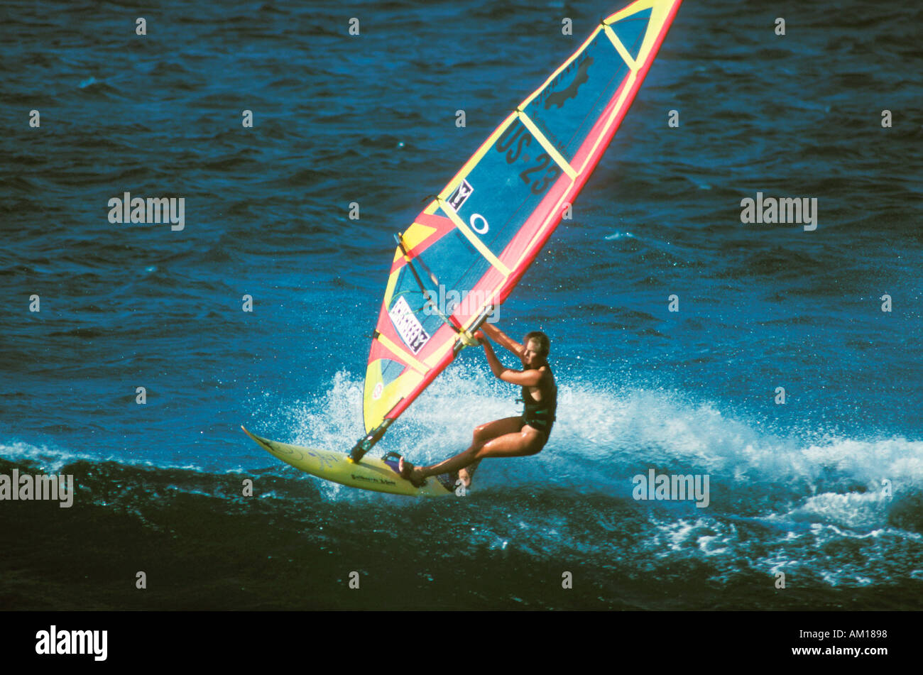 Female windsurfer on Ho Okipa Beach Maui Hawaii Stock Photo - Alamy