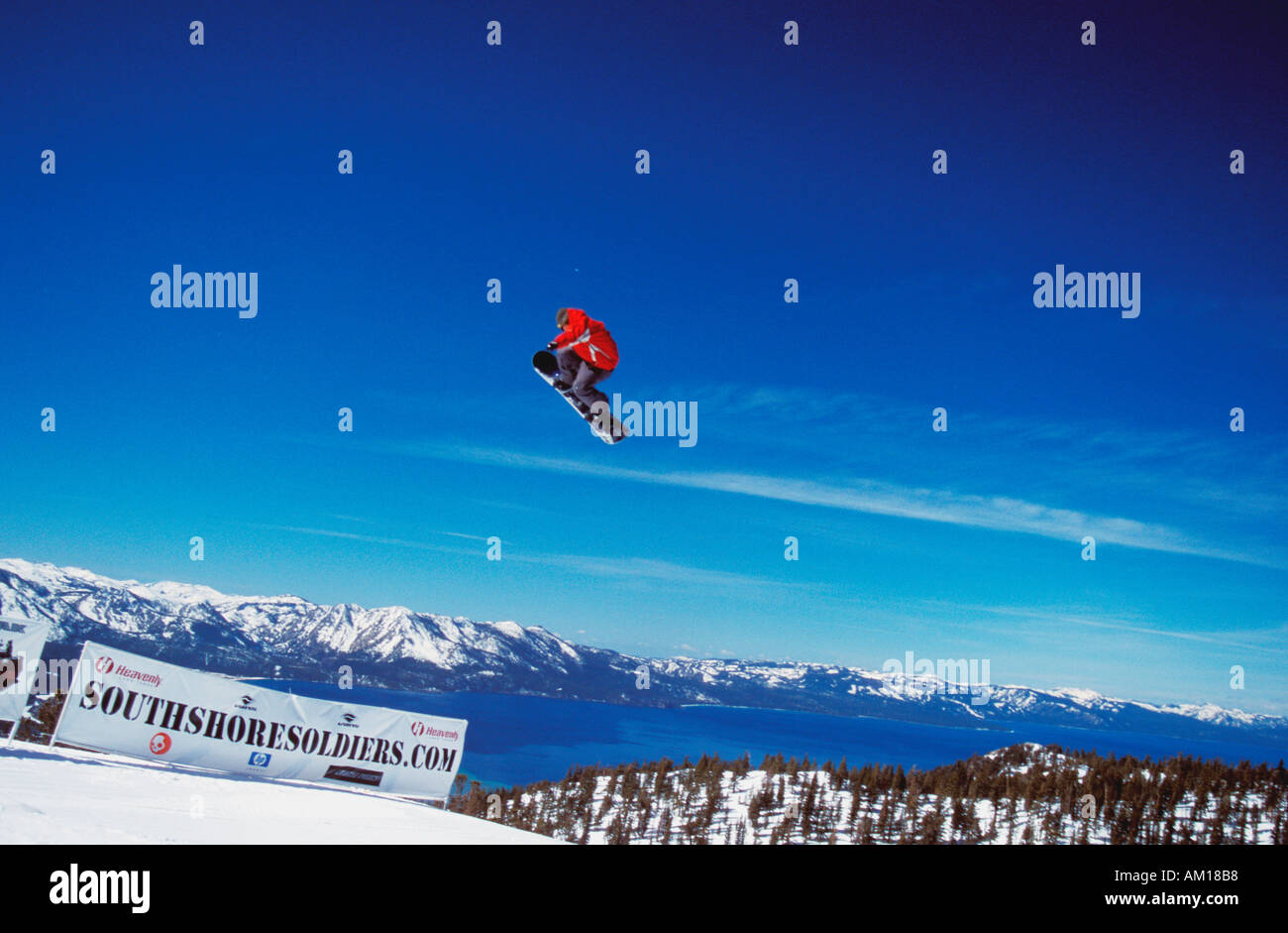 Clay Allison snowboarder in a grab high in the air in Heavenly Ski ...