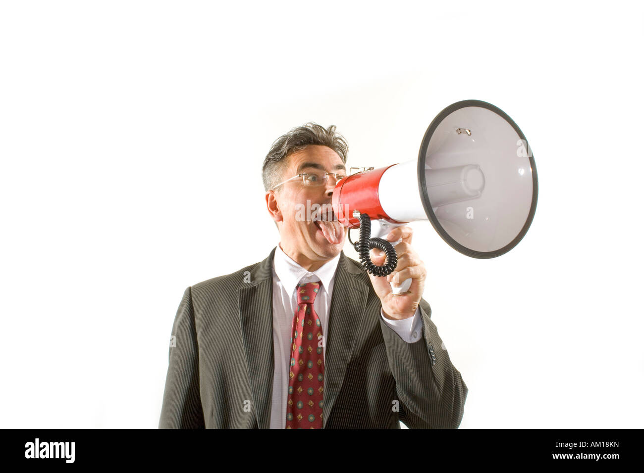 Business man screaming into a megaphone Stock Photo - Alamy