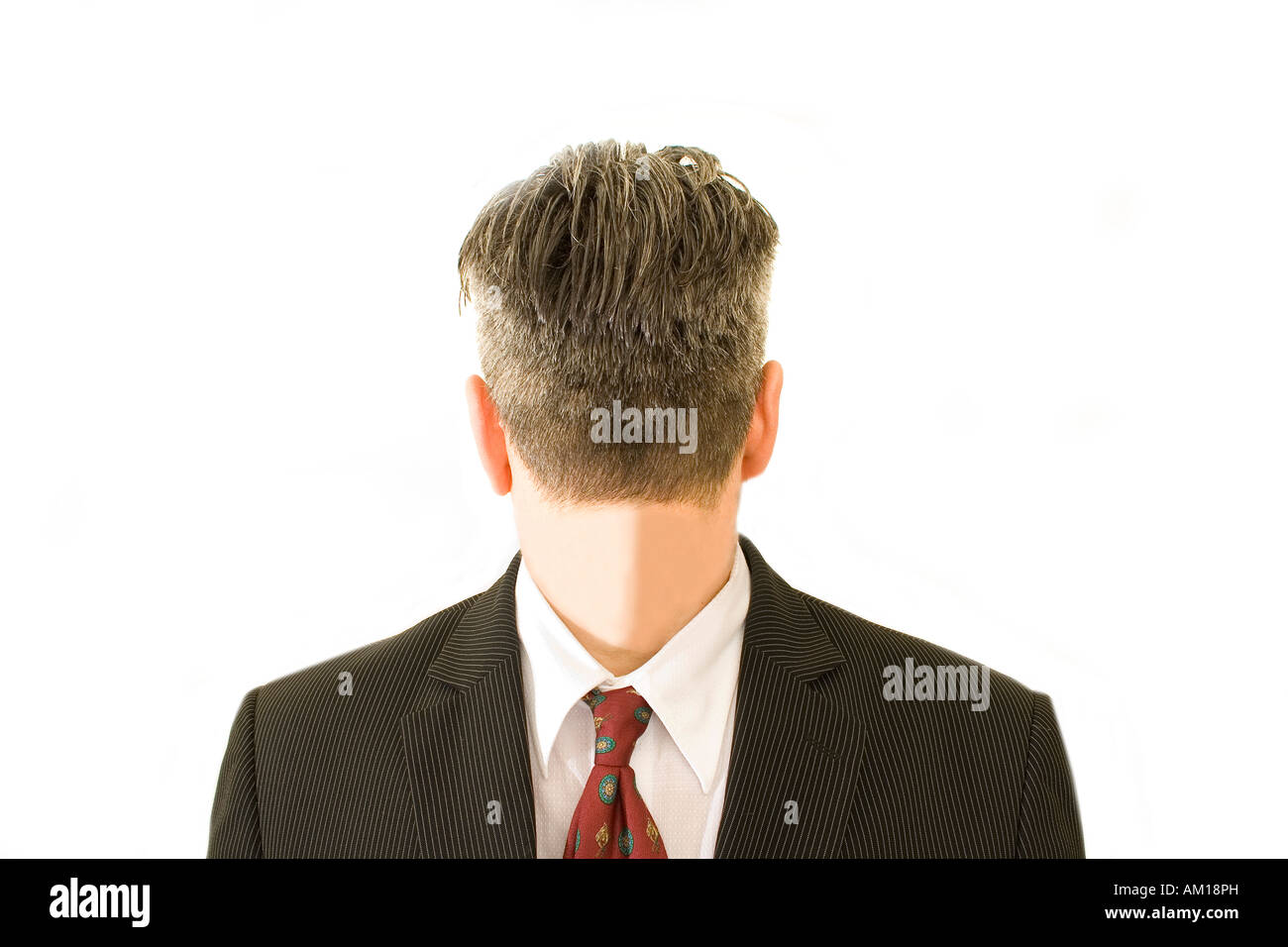 Business man with turned head Stock Photo - Alamy