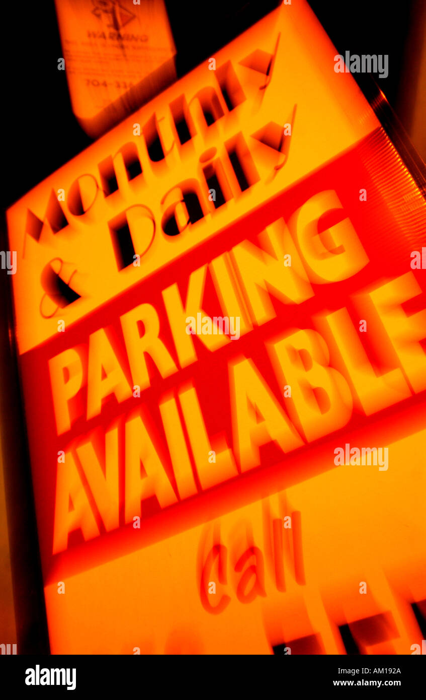 Vertical color image of a sign outside of a parking deck building in ...
