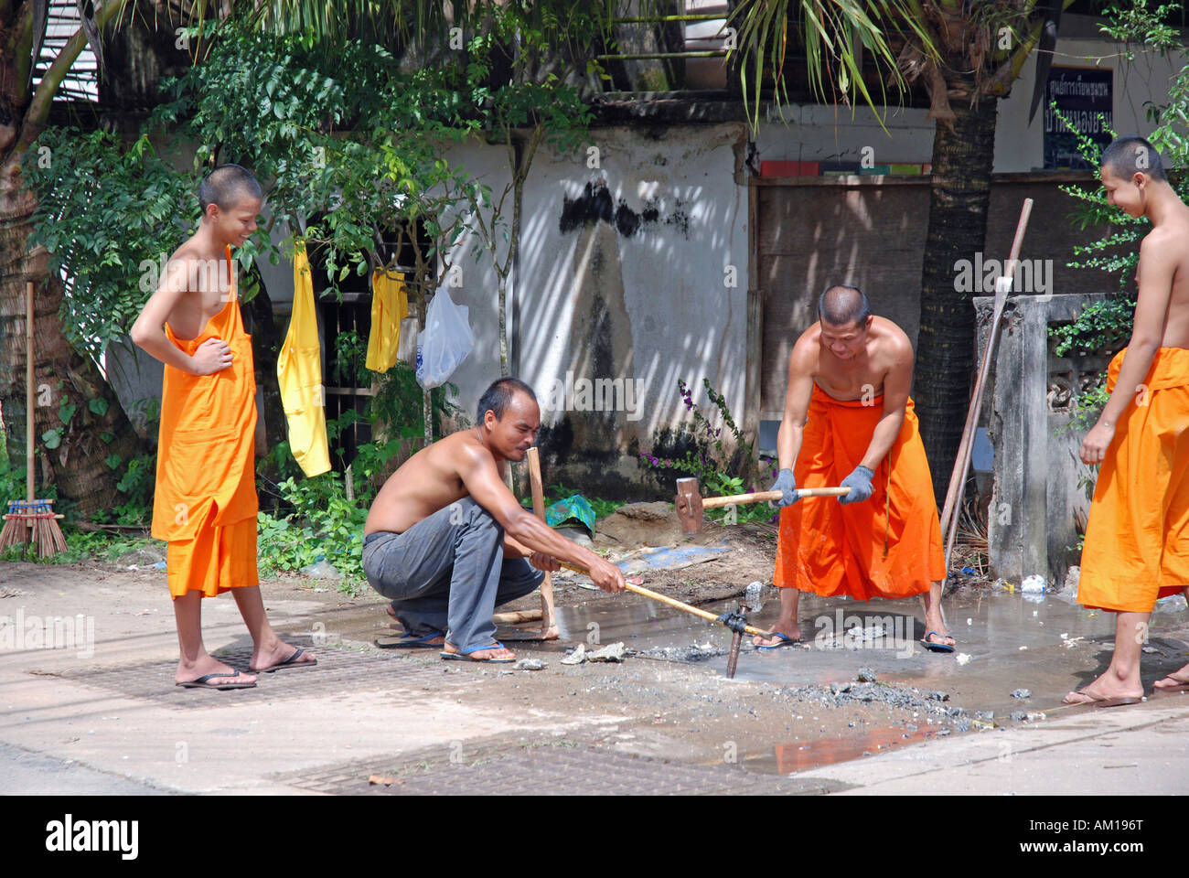 Monks working hi-res stock photography and images - Alamy