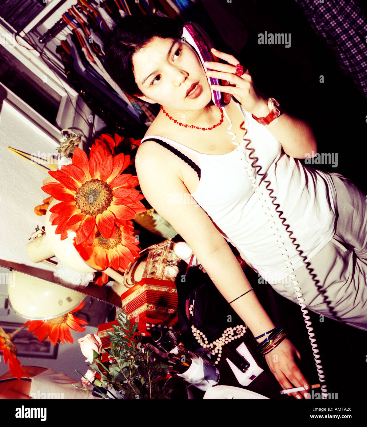 young pretty girl chatting on phone Stock Photo - Alamy