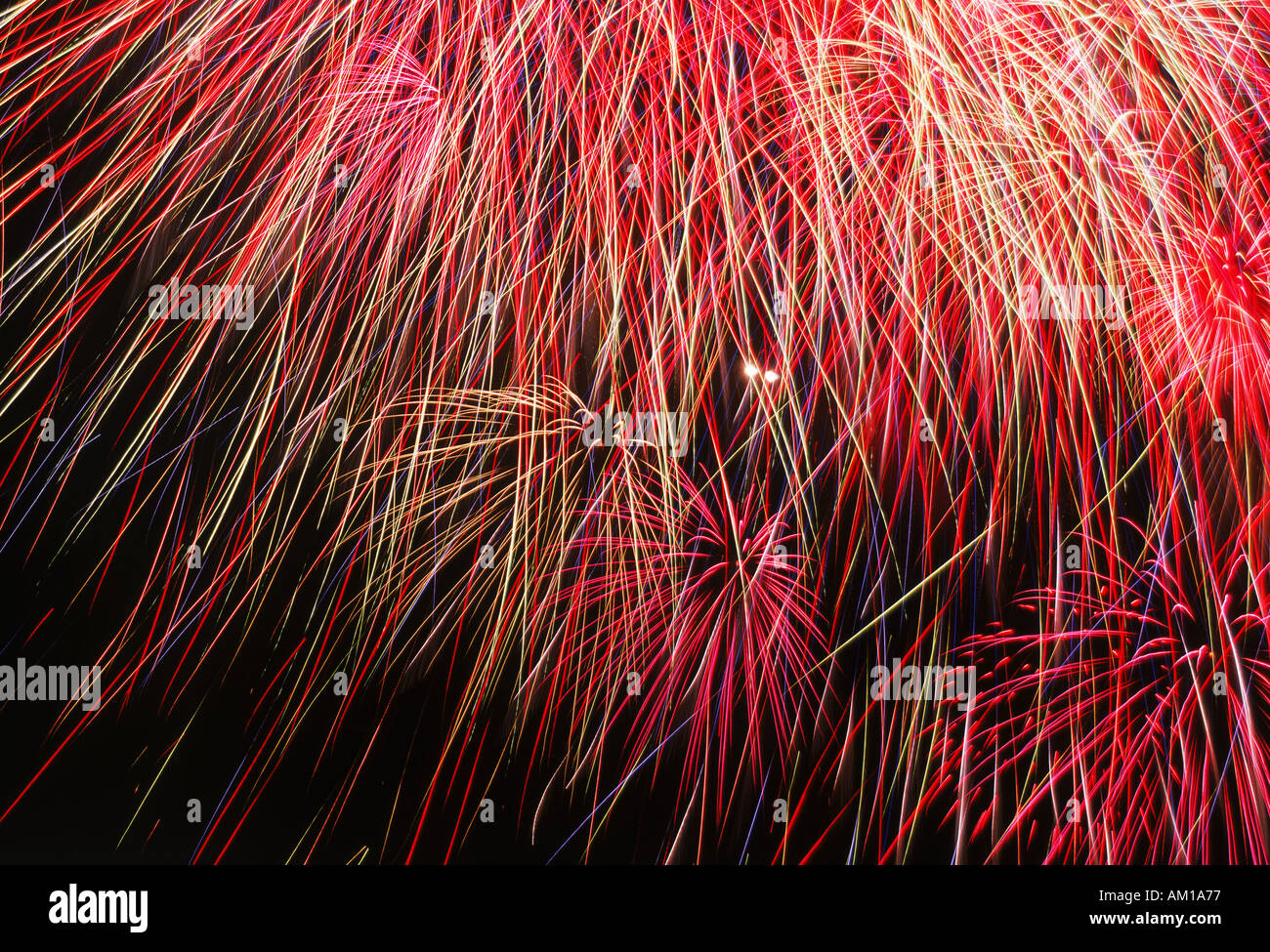 Fireworks exploding in night sky Stock Photo - Alamy