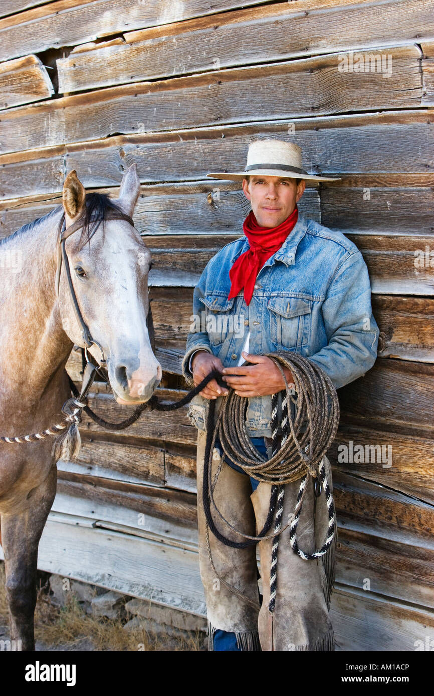 Cowboy with horse at barn, wildwest, Oregon, USA Stock Photo - Alamy