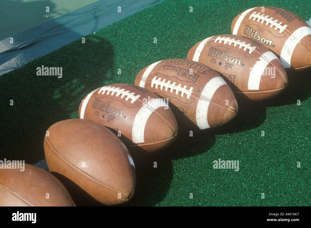 Row of Footballs Stock Photo - Alamy
