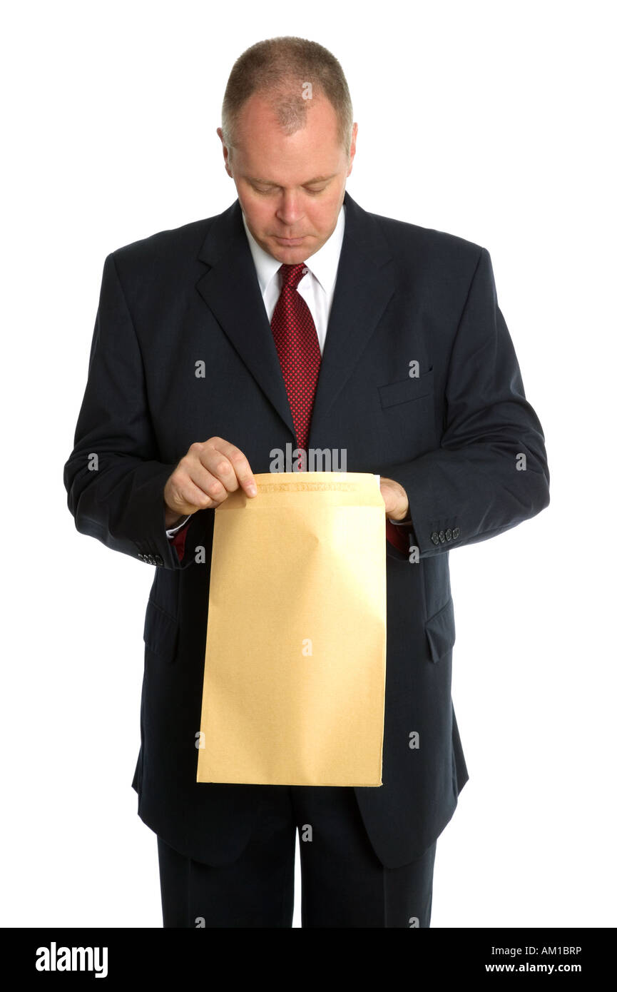 Businessman opening an envelope and looking inside Snail mail Stock ...