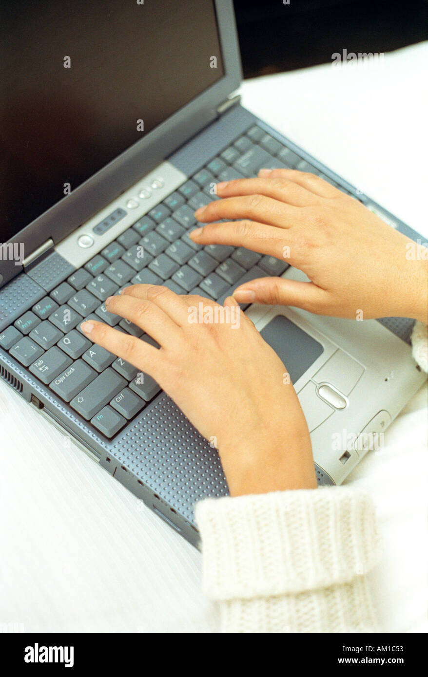 Typing on computer Stock Photo - Alamy