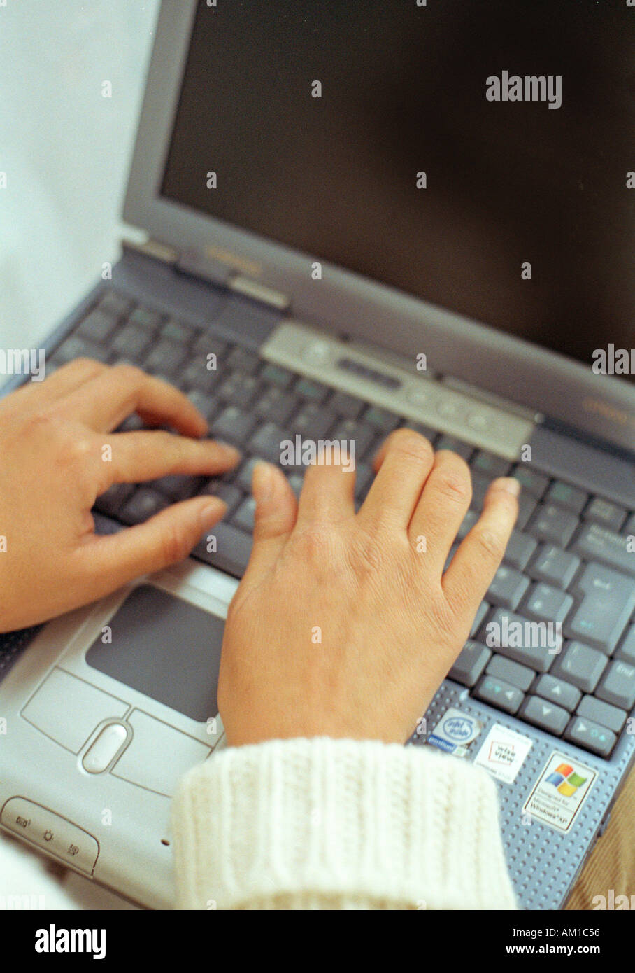 Typing on computer Stock Photo - Alamy