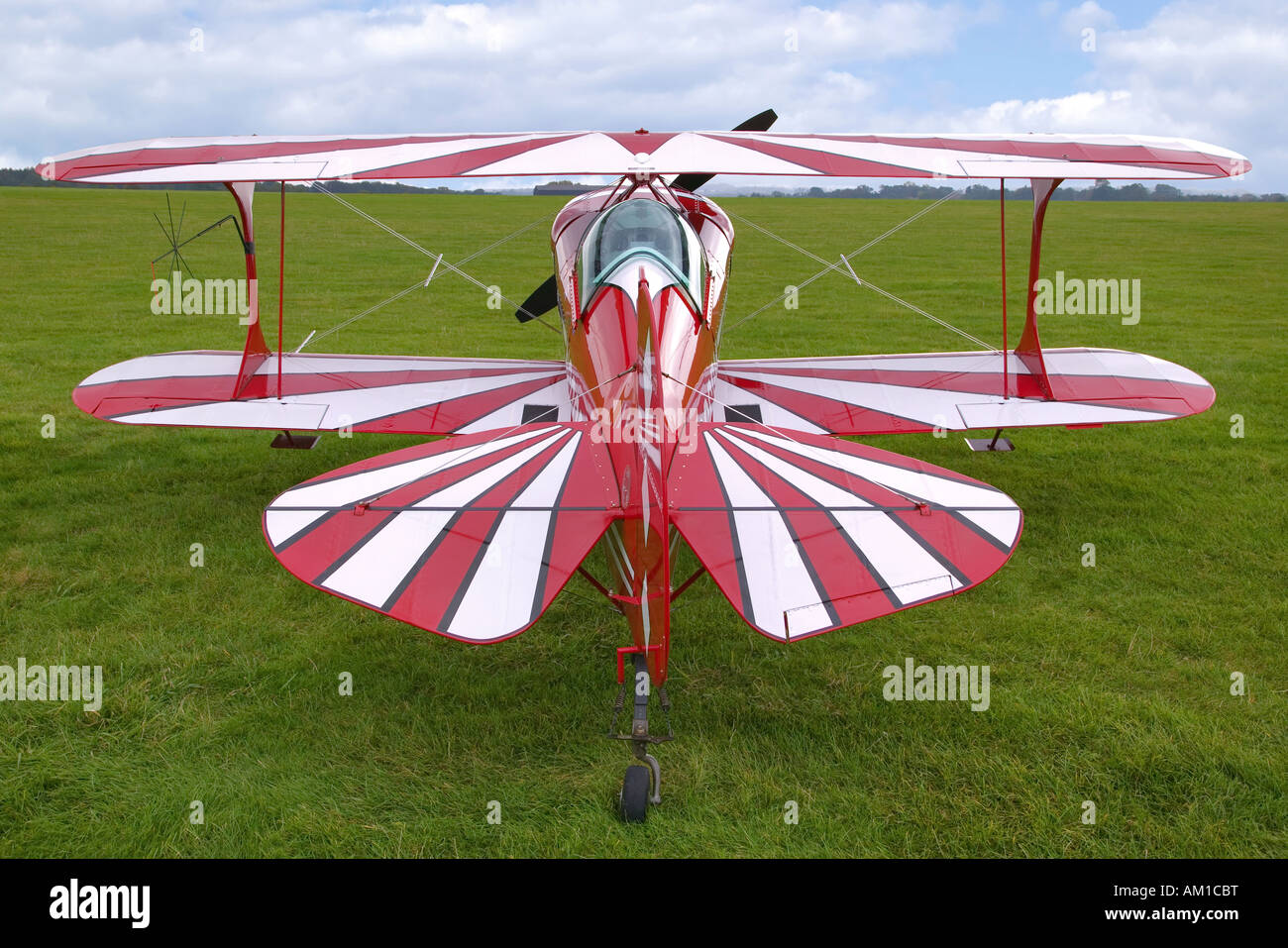 Rear view of a red biplane now used for aerobatics Stock Photo - Alamy