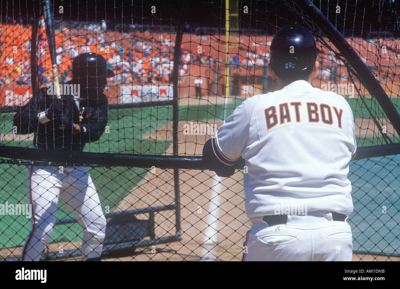 Rear view of Bat Boy observing pitcher at Baseball game Candlestick ...