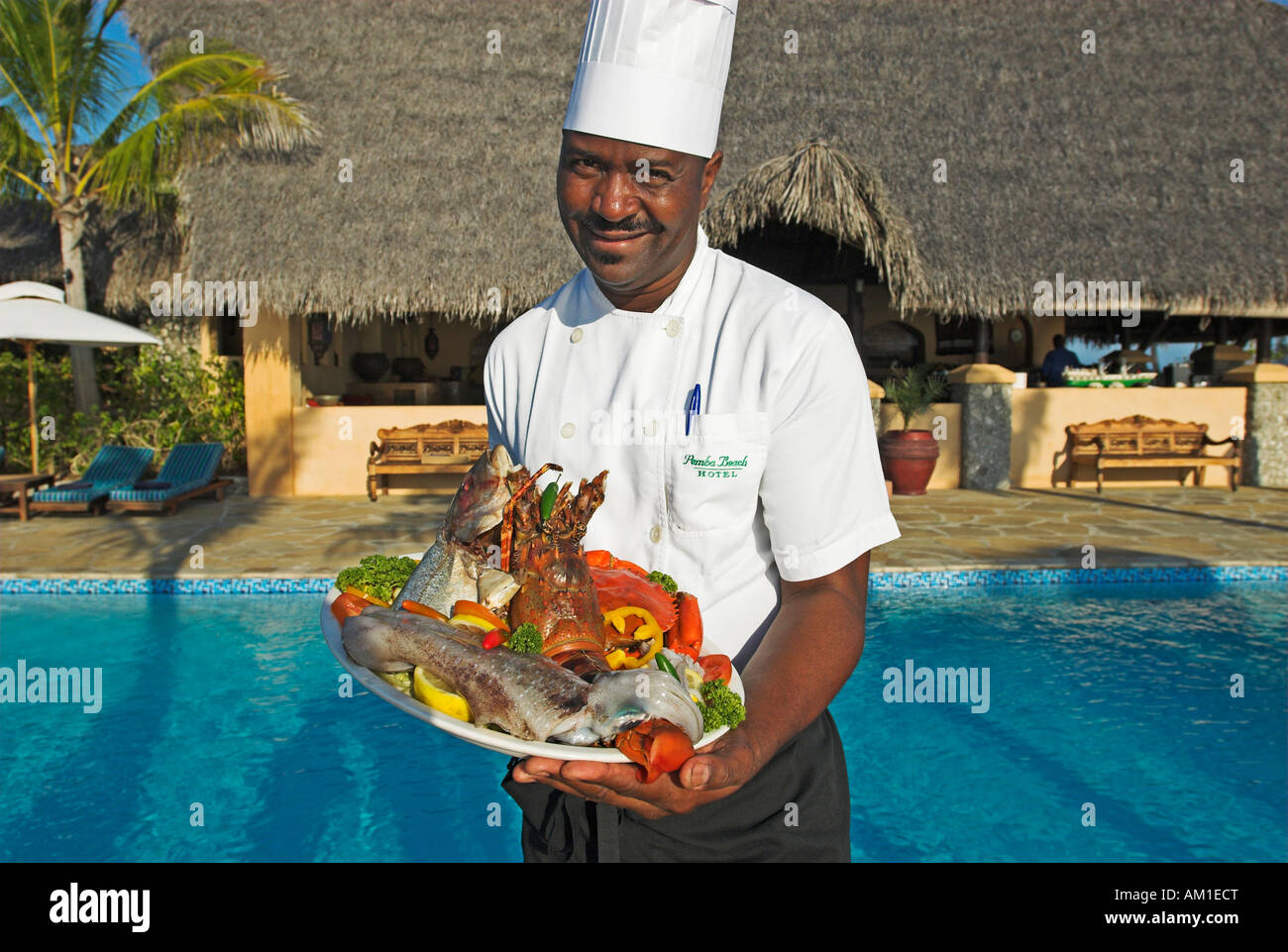 Chef with seafood at Matemo Island Resort, Quirimbas Islands ...