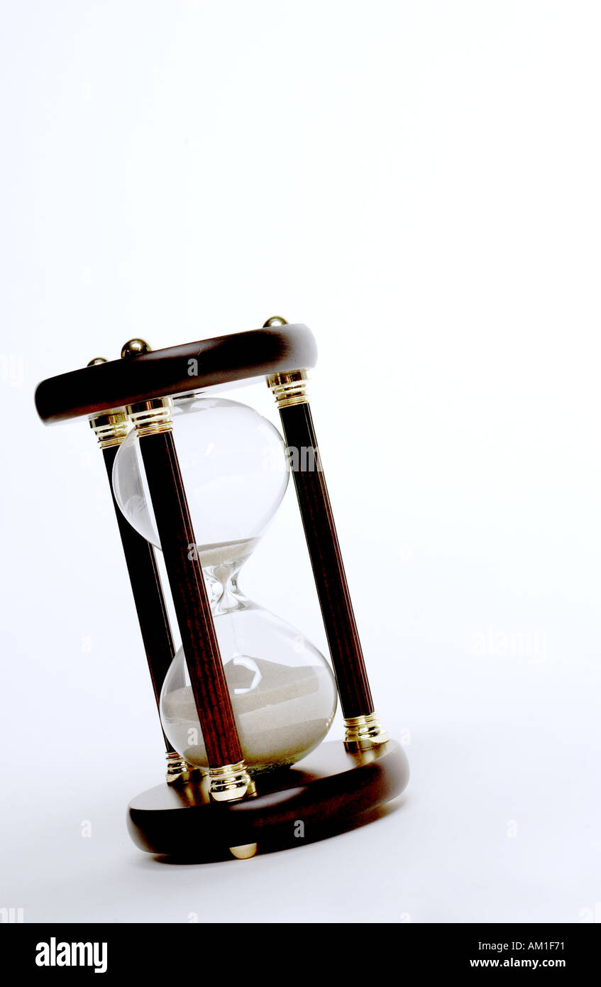 Vertical color image of an hourglass against a white background Stock ...