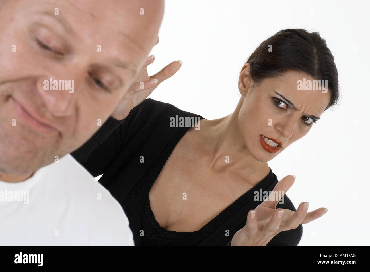 A woman is lecturing a man Stock Photo - Alamy