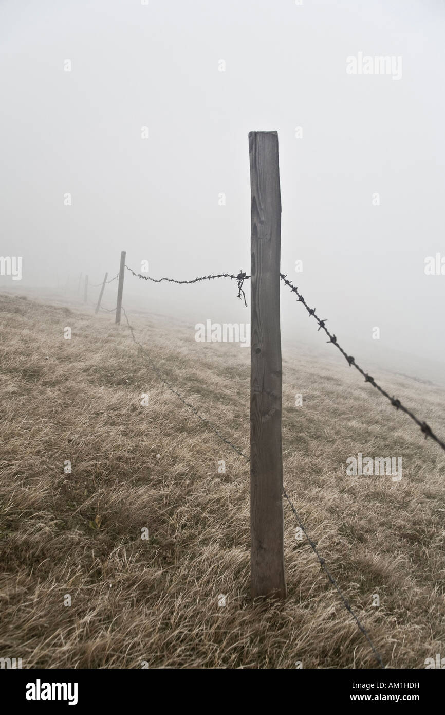 Fence with fog Stock Photo - Alamy