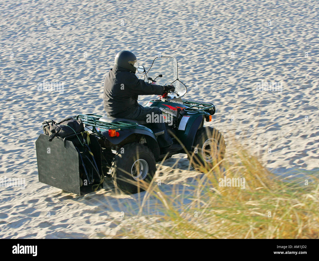 Disabled person driving on the beach Stock Photo - Alamy