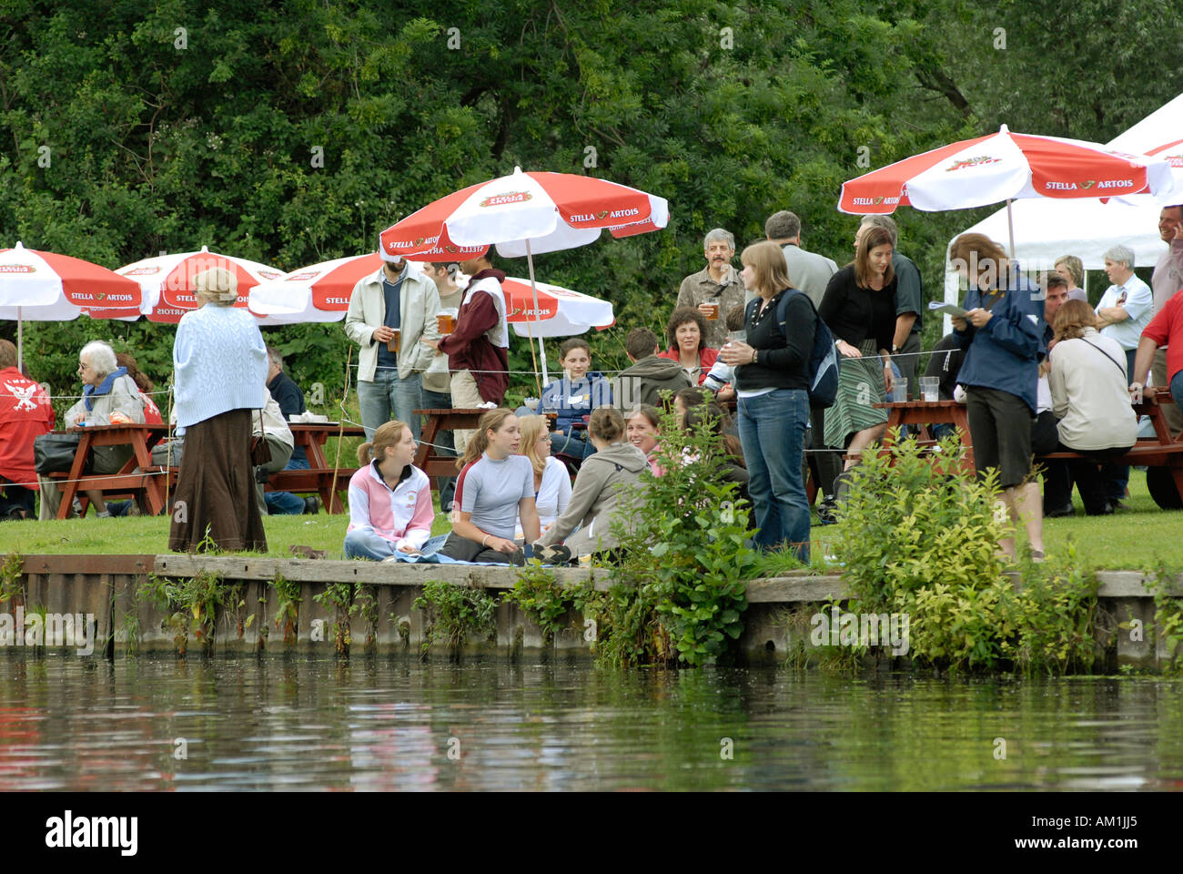 Spectators to the May Bumps in Cambridge taking a break between races ...