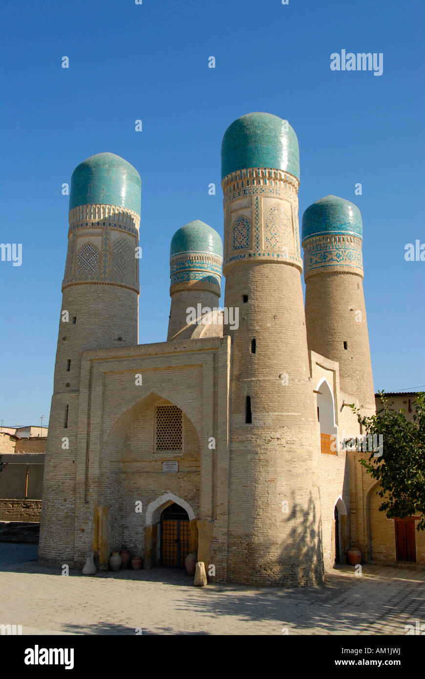 Four minarets with blue cupolas Char Minar gatehouse Bukhara Uzbekistan ...