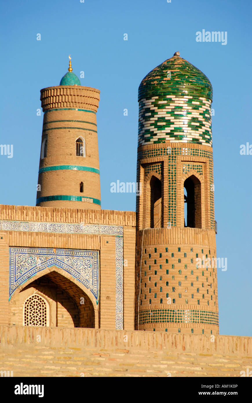 Minaret of Raxim Chan Madrasah and Minaret of Djuma Mosque in the old ...