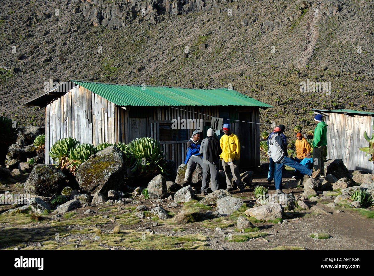 Local porters at mountain hut in Shipto's Camp (4200 m) Mount Kenya ...
