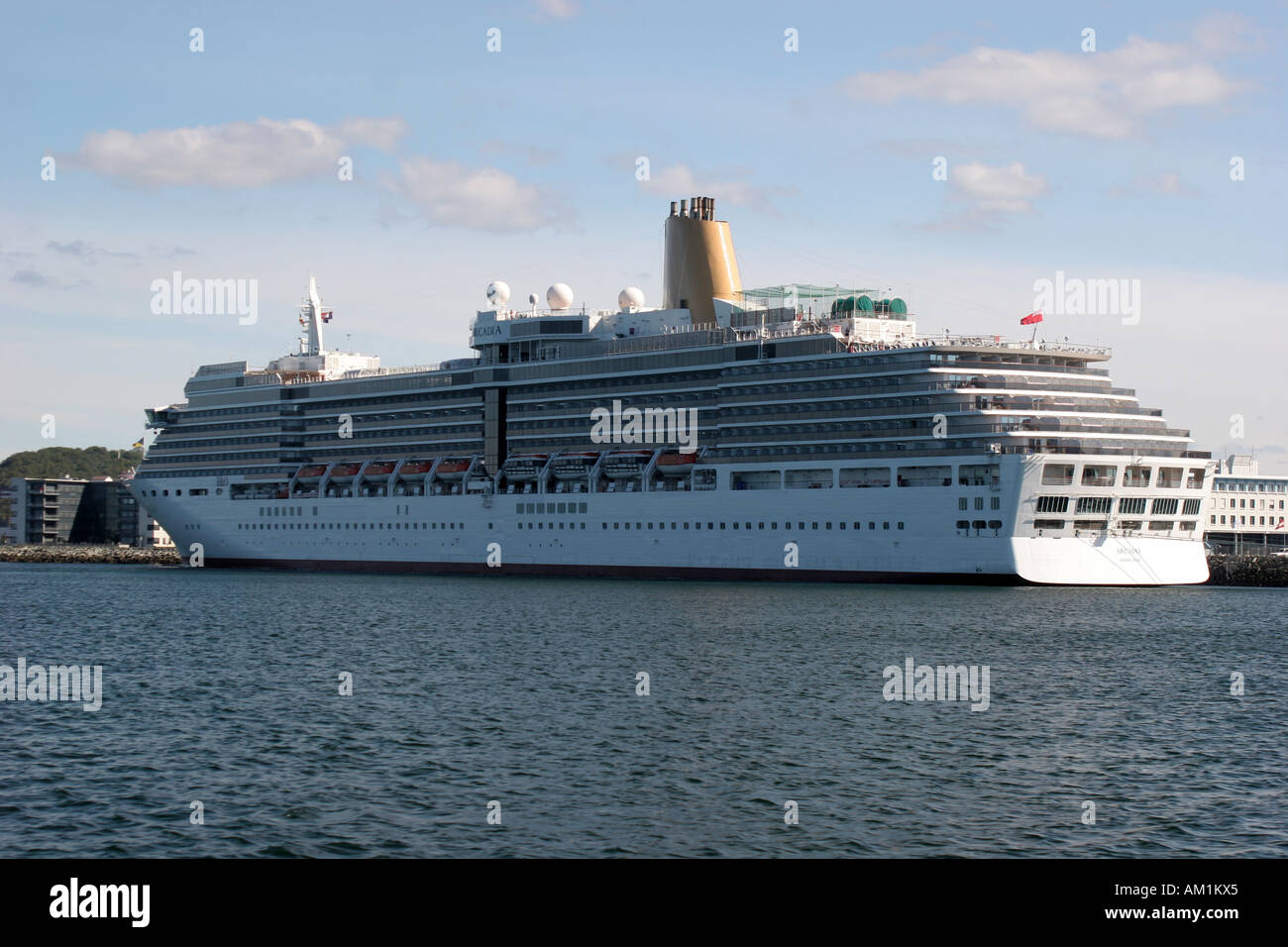 big cruising ship on harbor bay Stock Photo - Alamy