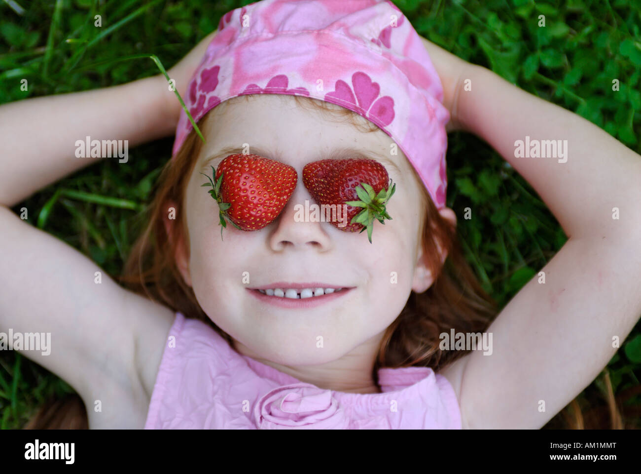 Child eating strawberries Stock Photo - Alamy Child eating strawberries Stock Photo - Alamy