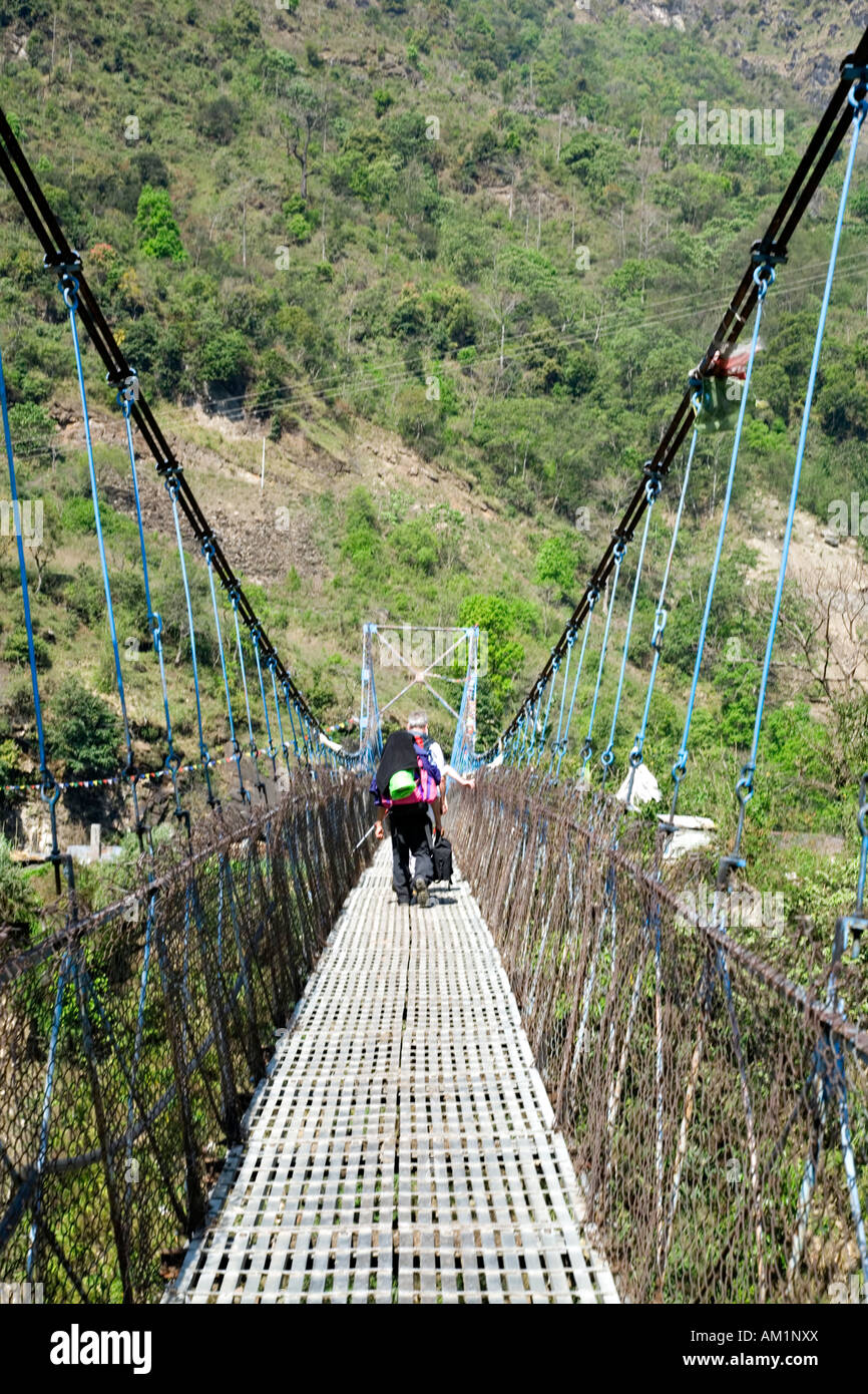 Crossing a bridge. Near Nadi Bazar. Annapurna circuit trek. Nepal Stock ...