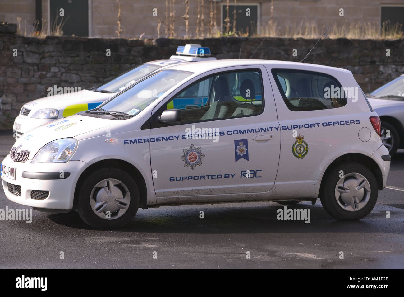 community support officers car and police car Stock Photo - Alamy