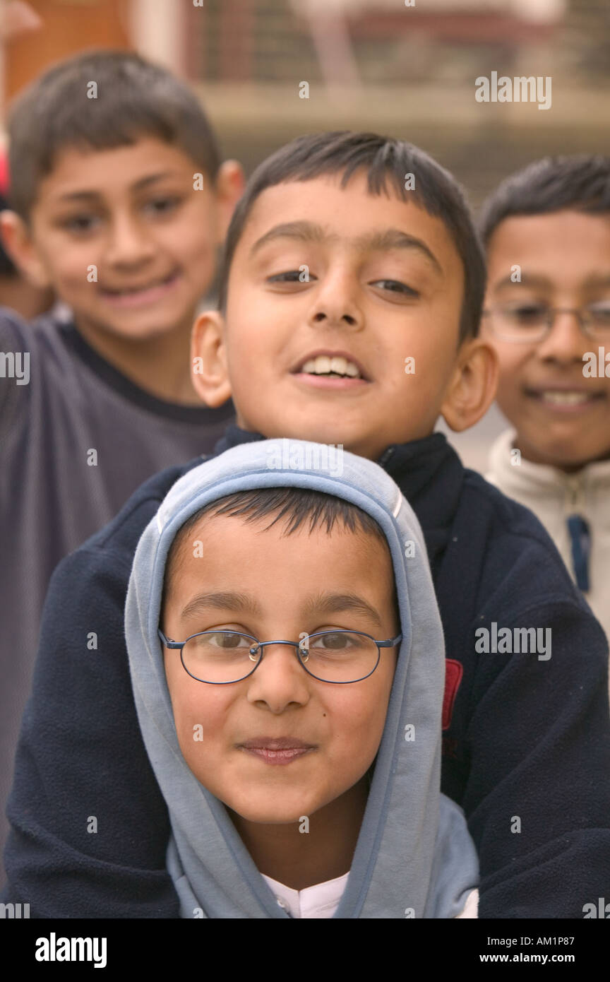 Asian children on the streets of Burnley Lancashire Stock Photo - Alamy