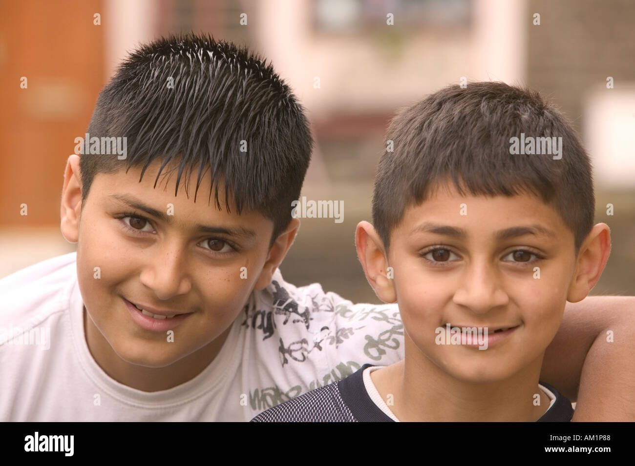 Asian children on the streets of Burnley Lancashire Stock Photo - Alamy