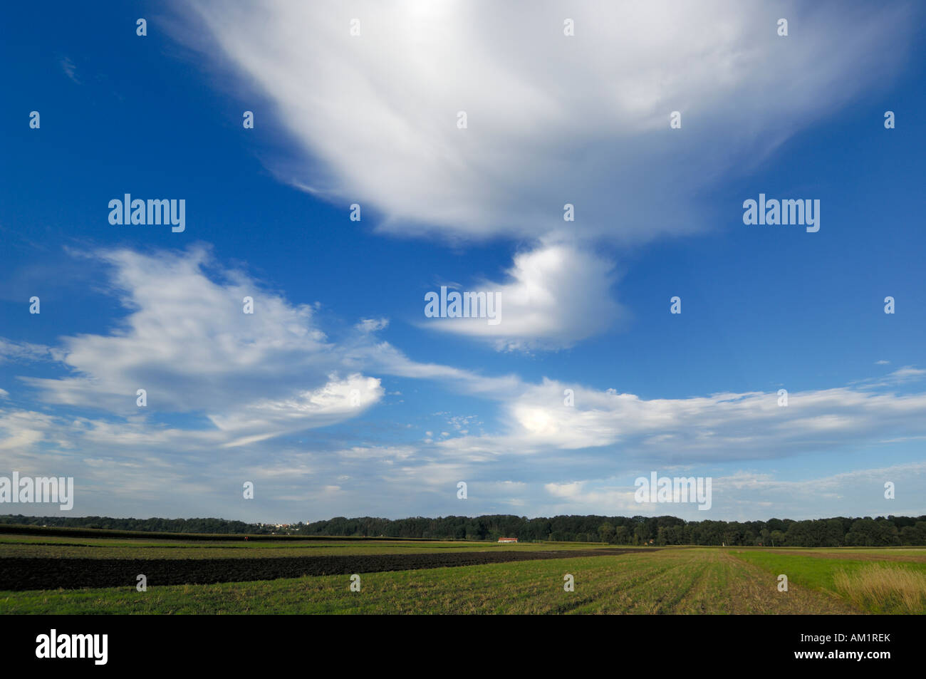 Cloud formation over field Stock Photo - Alamy