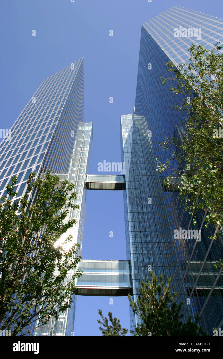 Twin towers with bridge across Highlight Towers high-rise building ...