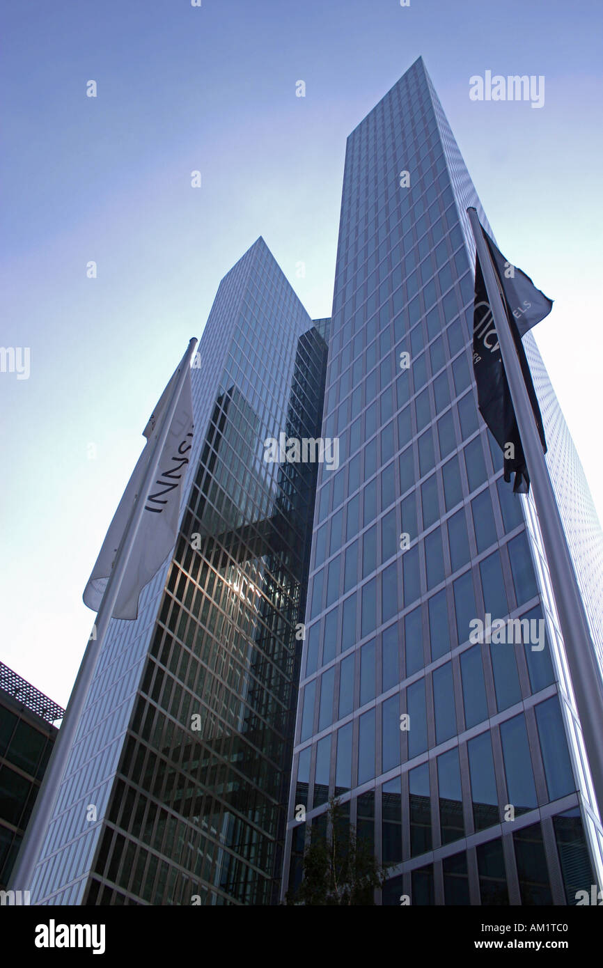 Twin towers with bridge across Highlight Towers highrise building ...