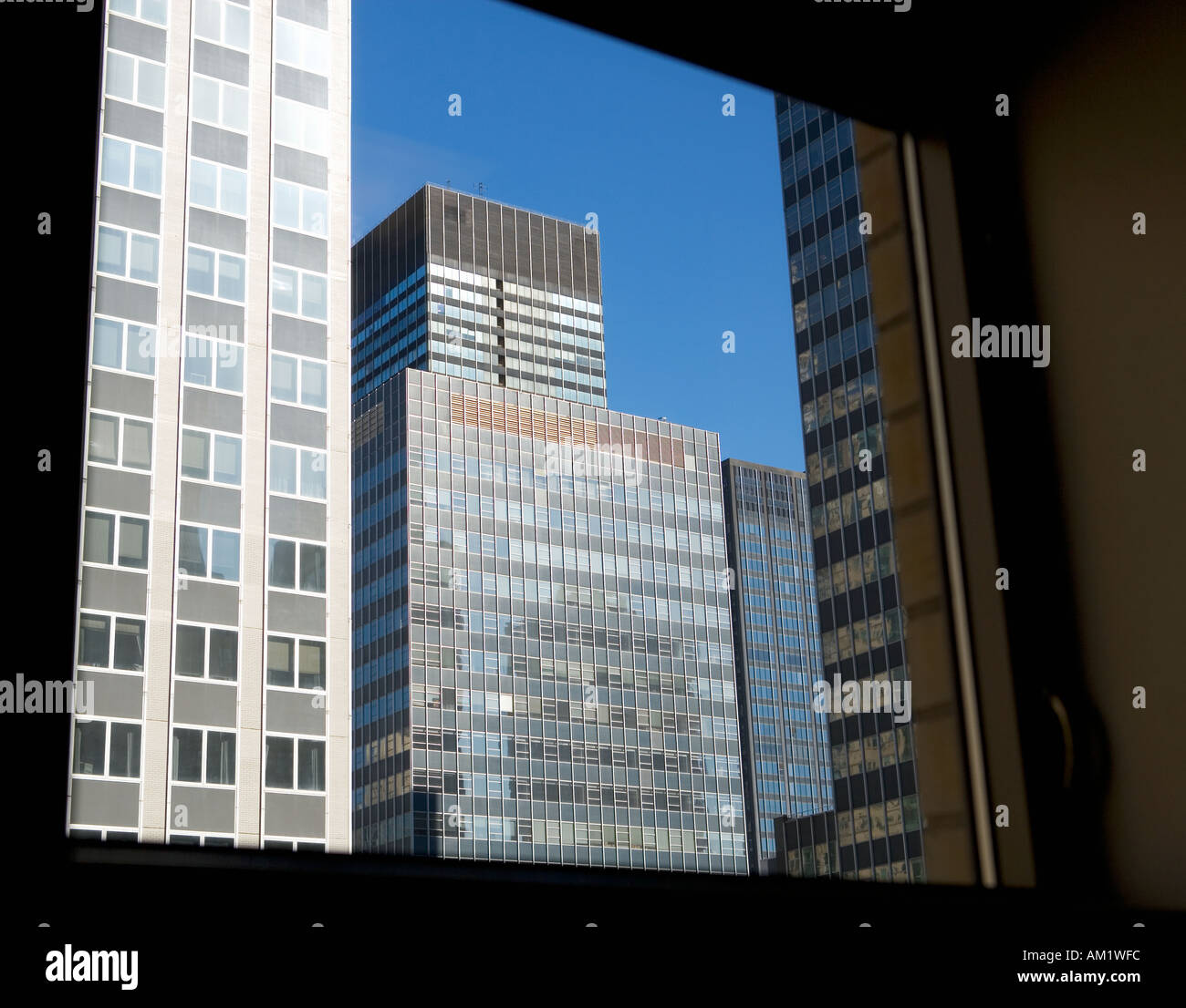 NYC offices through window Stock Photo - Alamy