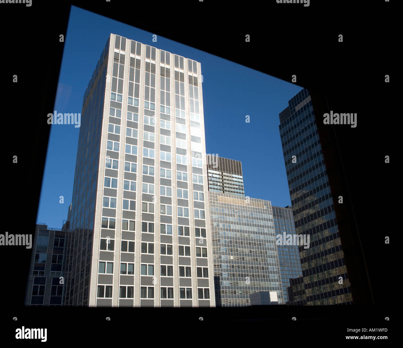NYC offices through window Stock Photo - Alamy