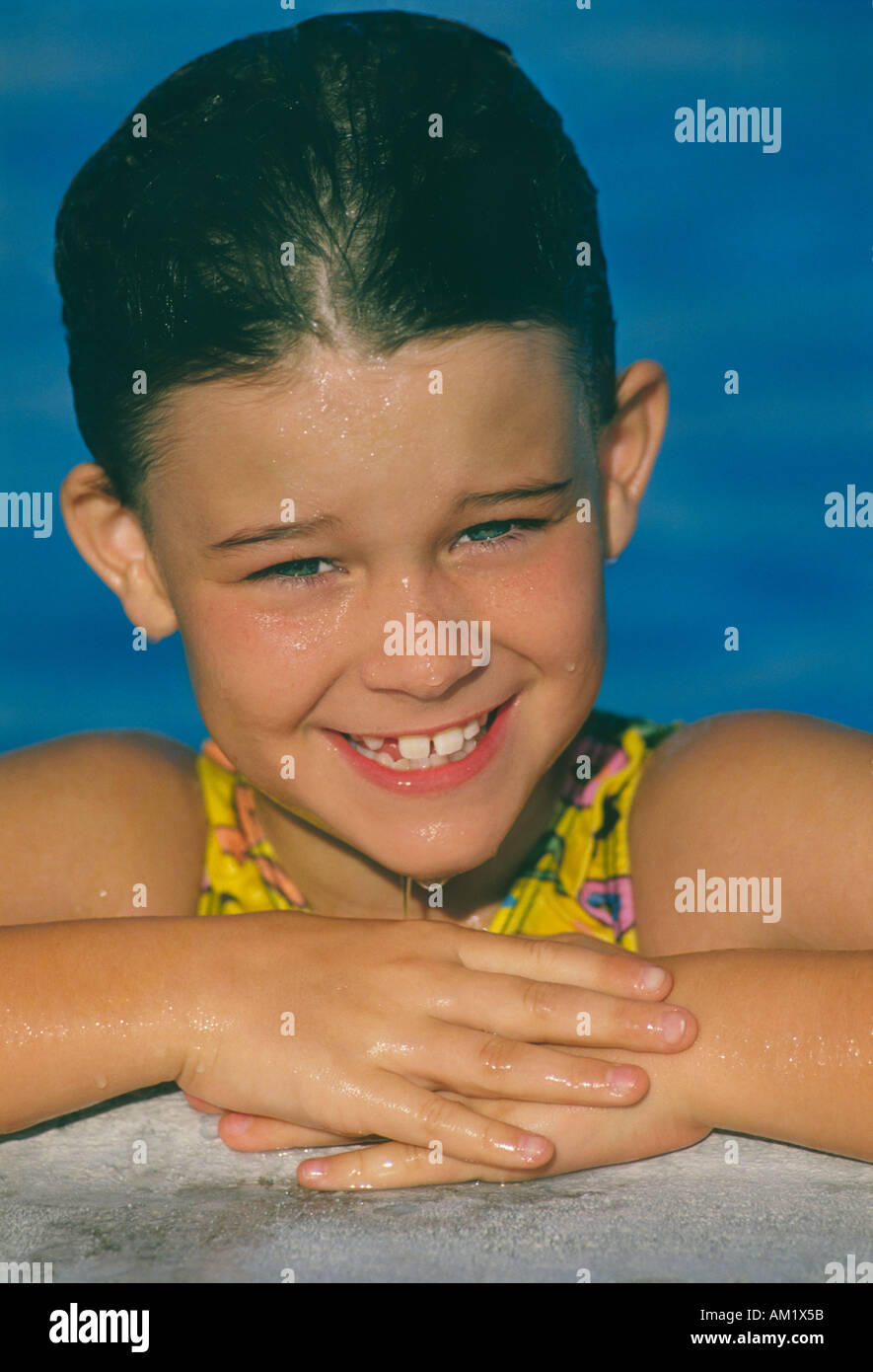 Girl posing poolside in hi-res stock photography and images - Alamy