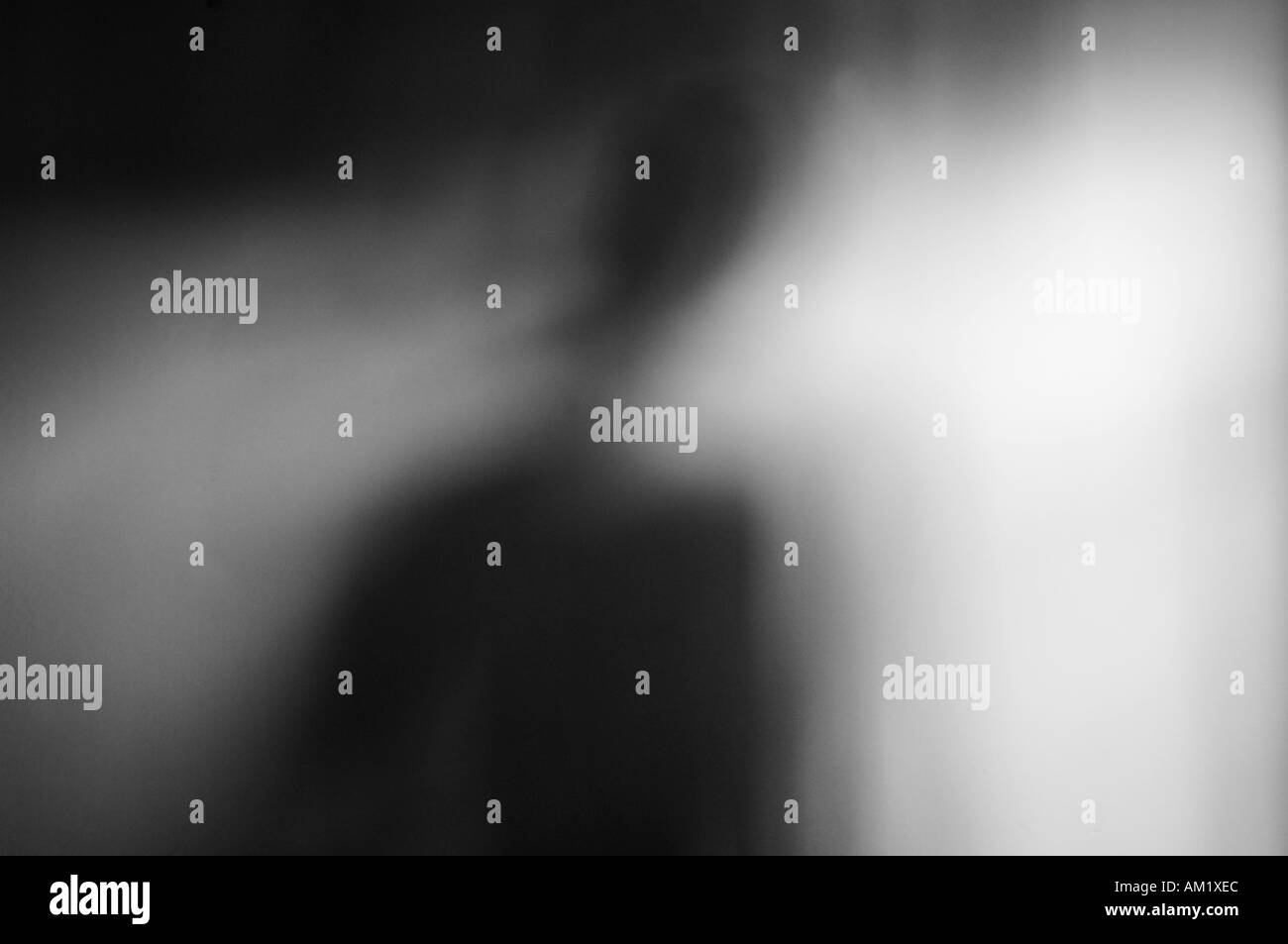 Scary shadow figure Black and White Stock Photos & Images - Alamy