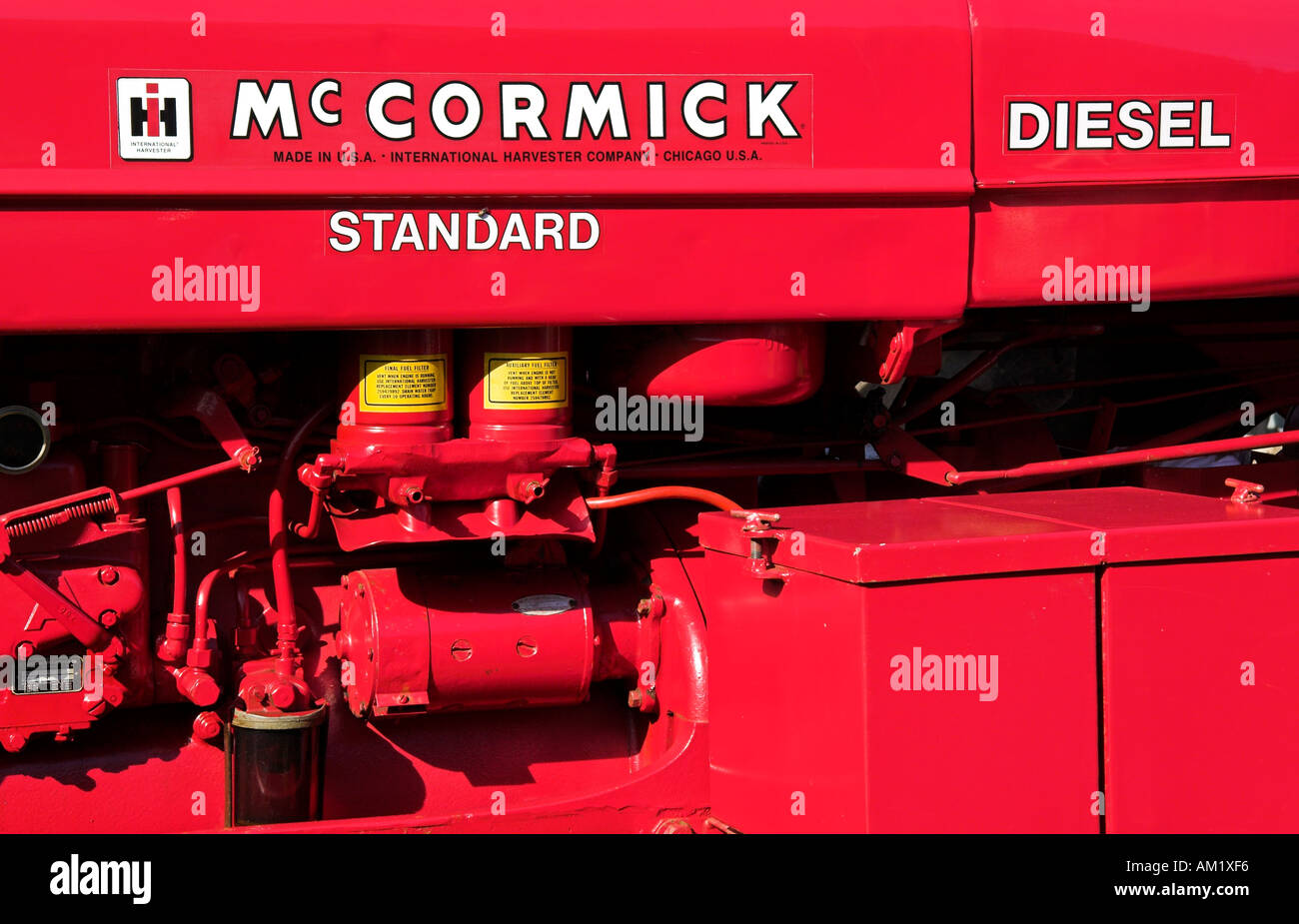 AMERICAN TRACTOR DETAIL The engine of a tractor Stock Photo - Alamy