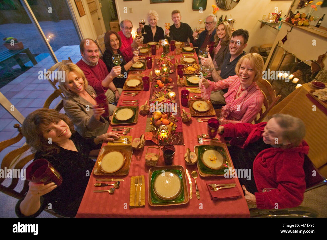 Guests at an elegant Thanksgiving dinner party Stock Photo - Alamy