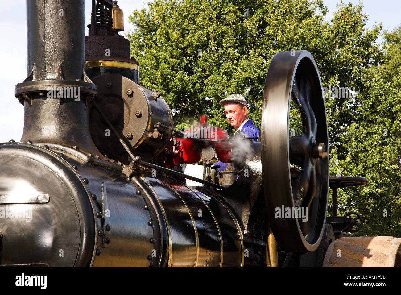THE ENGINE DRIVER Man on a steam Traction Engine Stock Photo - Alamy