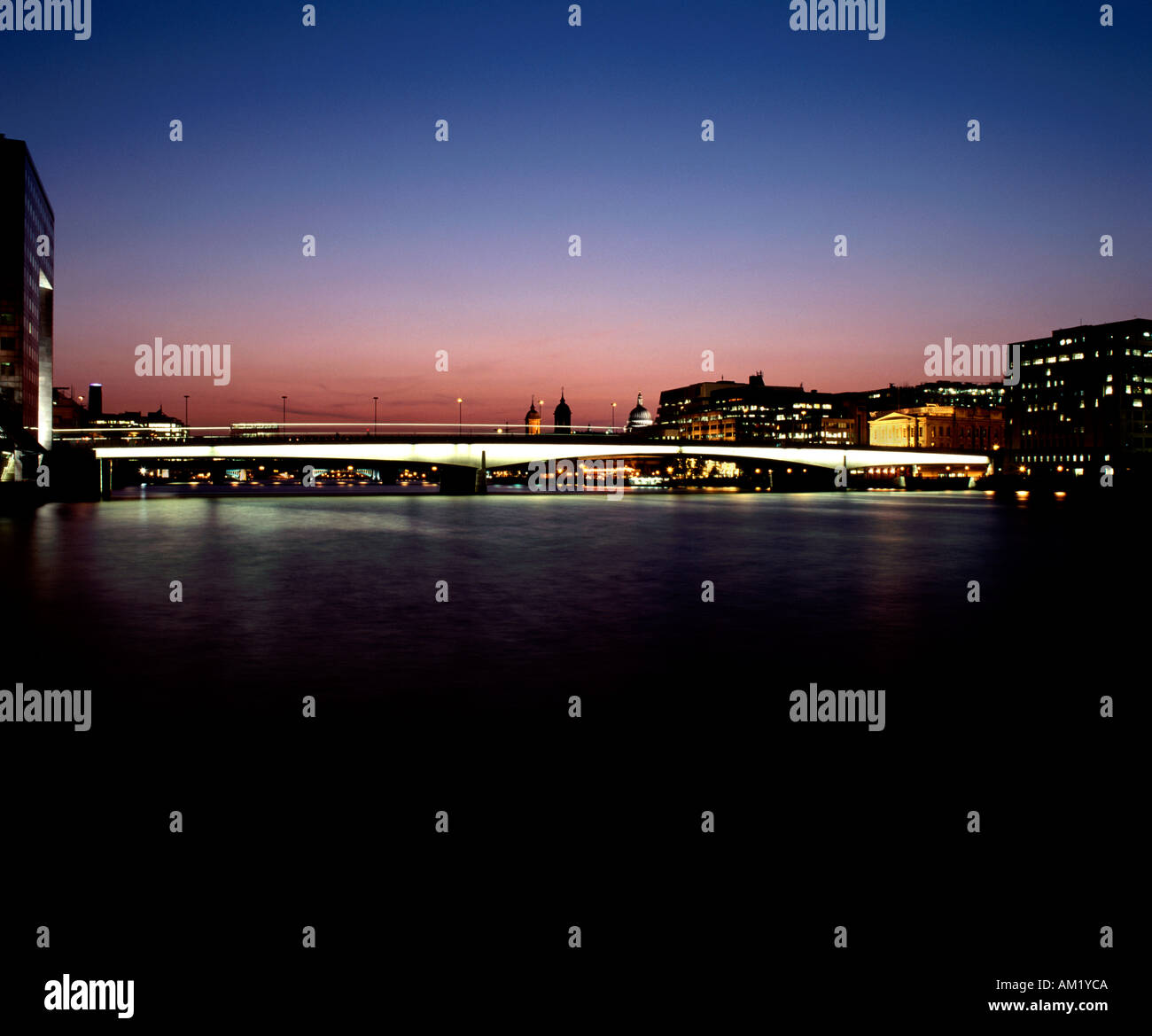 london bridge with bus and light trails dusk shot Stock Photo - Alamy