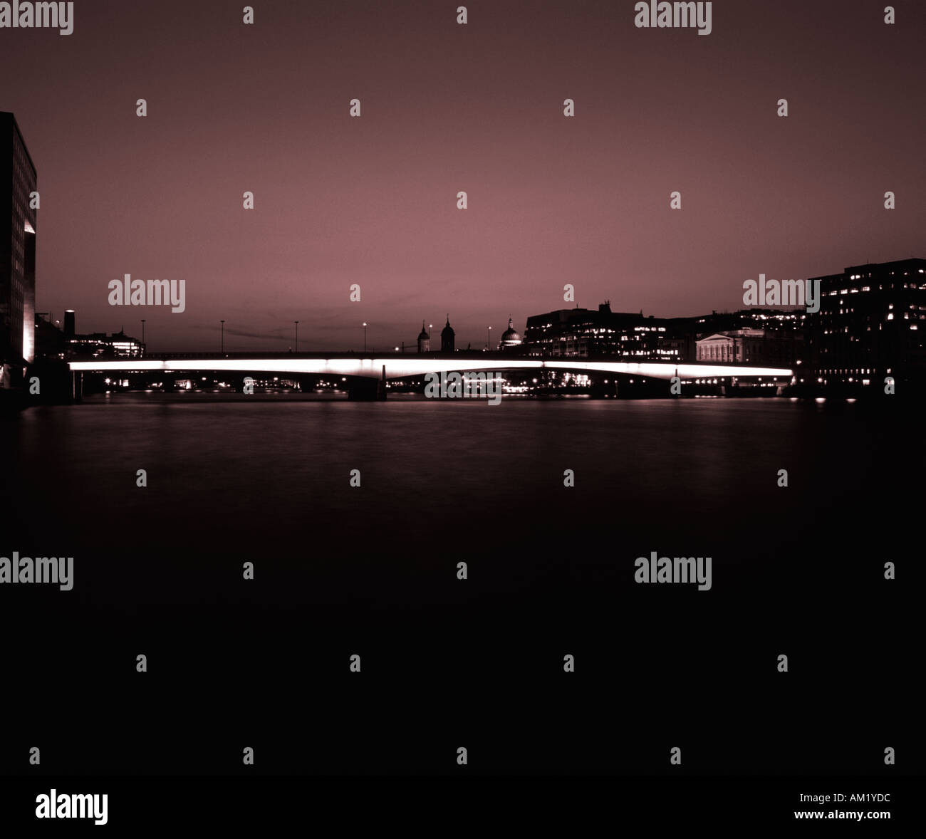 London Bridge at night with slight pink tint Stock Photo - Alamy