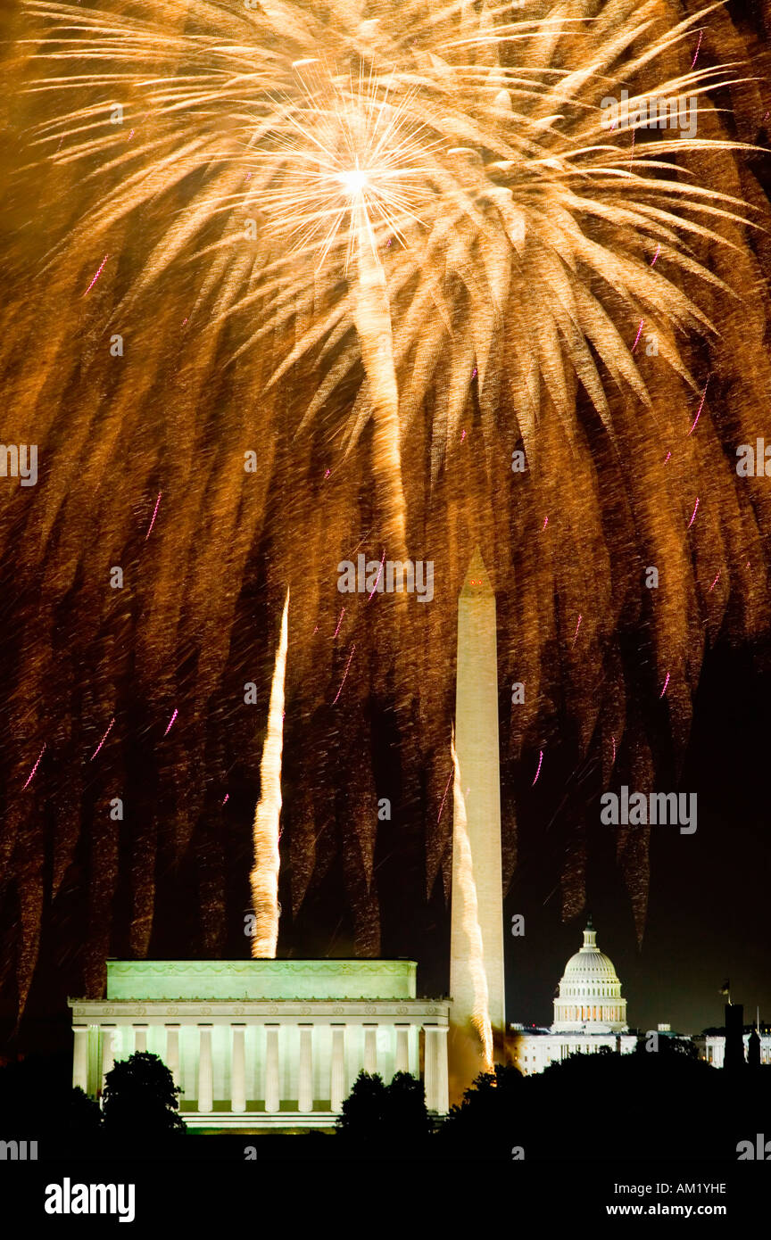 Fourth of July celebration with fireworks exploding over the Lincoln Memorial Washington ...