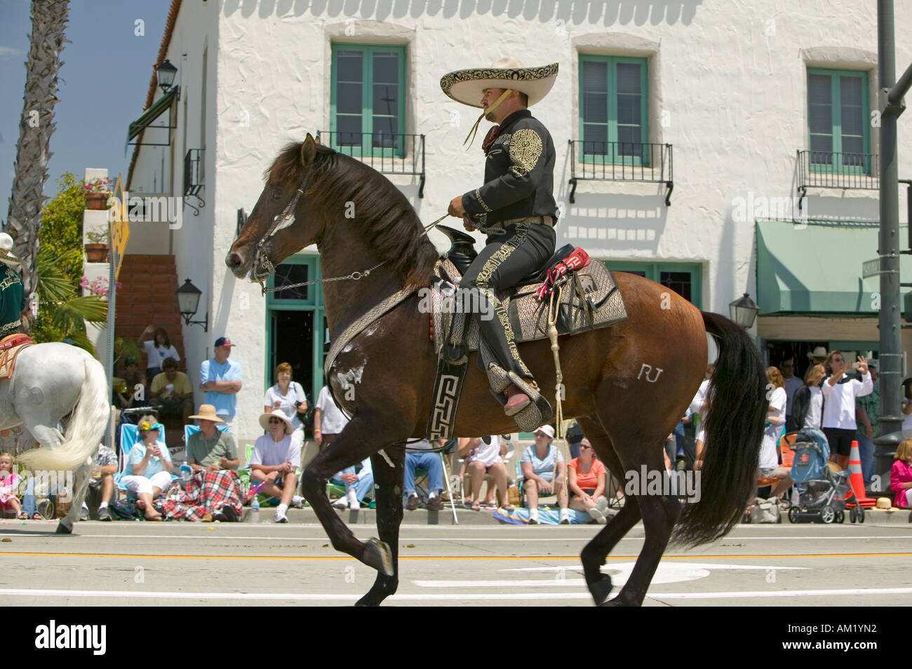 Spanish cowboy on horseback during opening day parade down State Street ...