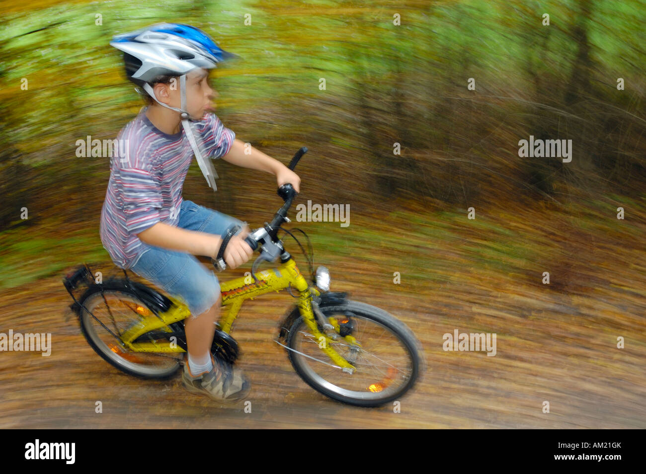 Fast cycling child Stock Photo - Alamy