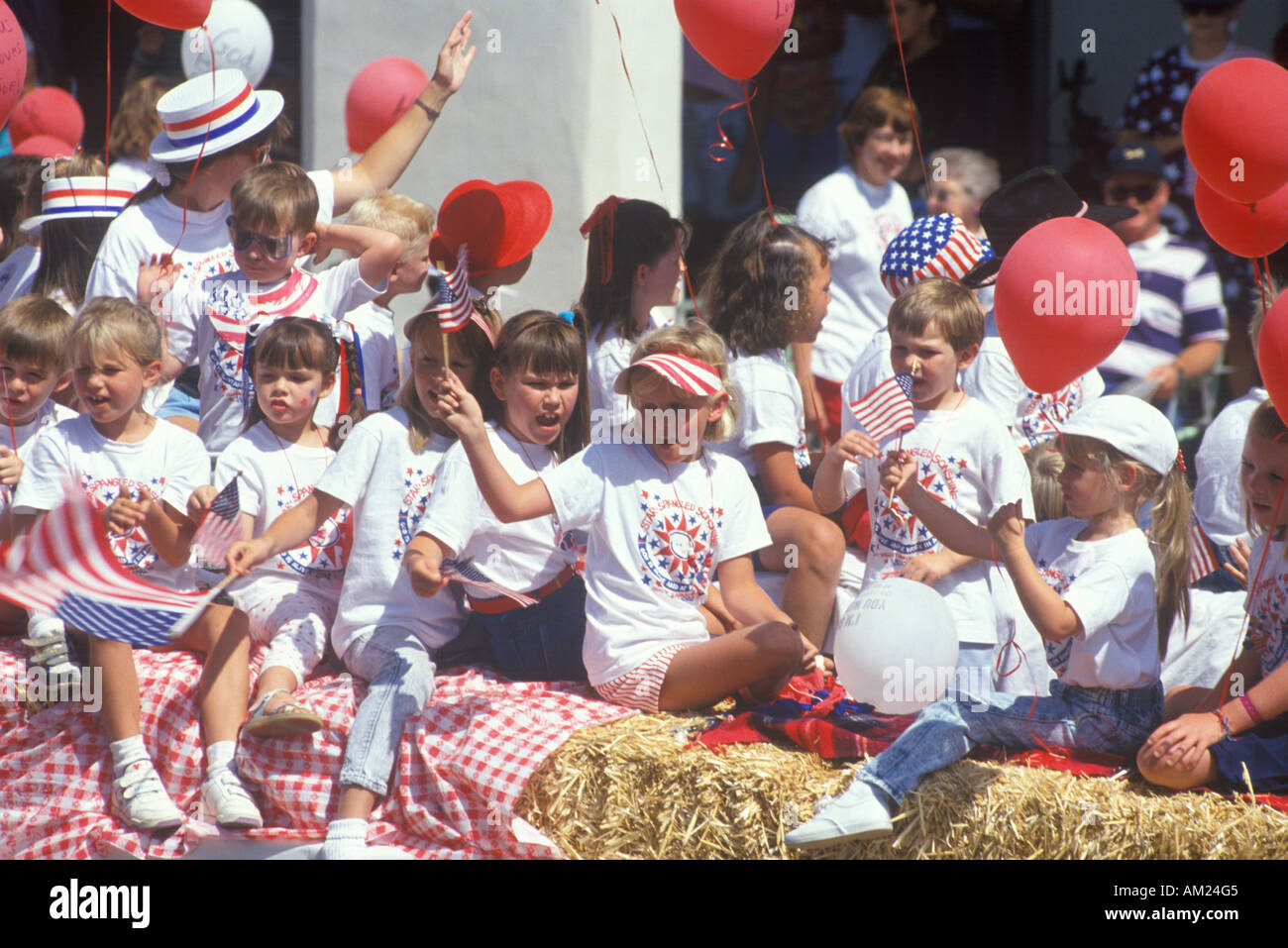 Children on parade float july hi-res stock photography and images - Alamy