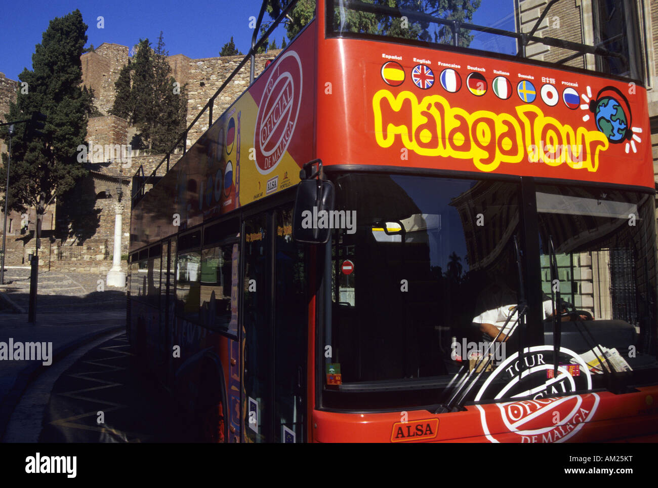 Tourist bus in front of Alcazaba MALAGA Andalusia region Spain Stock ...
